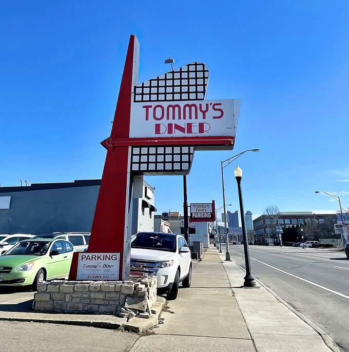 That iconic red and white sign isn't just announcing a diner&mdash;it's promising a time machine to when breakfast was an art form and calories didn't count.