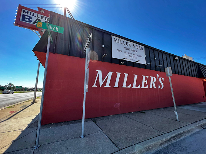 The bright red exterior of Miller's Bar stands like a beacon of burger hope on Michigan Avenue, promising delicious simplicity without the fanfare.