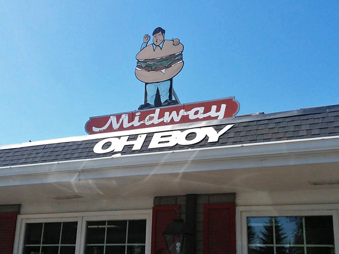 That burger man on the roof isn't just decoration&mdash;he's a promise of what awaits inside. Simple, delicious, and utterly unpretentious.