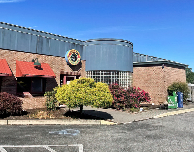 That classic brick-and-blue exterior whispers "real food lives here" to anyone with breakfast wisdom.