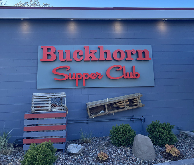 The blue exterior with that iconic red signage says it all – Wisconsin supper club magic awaits behind these doors. Lobster traps add that perfect lakeside touch.