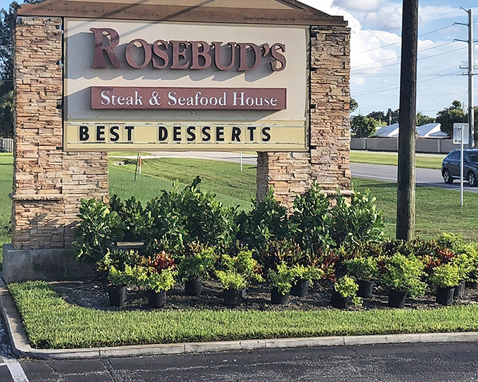That roadside sign isn't just advertising &ndash; it's a beacon of hope for hungry travelers seeking refuge from chain restaurants.