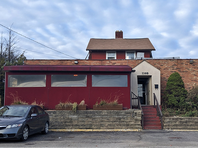Behind this unassuming burgundy facade lies Columbus's best-kept pizza secret&mdash;proof that extraordinary flavors often hide in ordinary places.