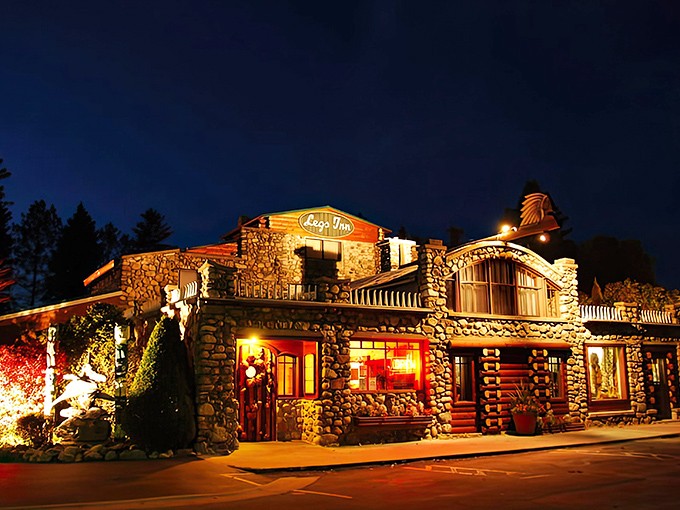 Your GPS might question your sanity, but those towering wooden totems confirm you've found Michigan's most wonderfully eccentric dining destination.