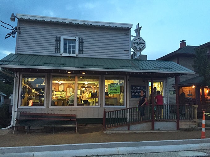 As dusk settles, the restaurant's warm glow beckons hungry travelers like a lighthouse for comfort food enthusiasts navigating the sea of chain restaurants.