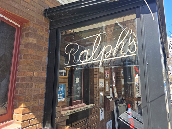 The iconic neon script beckons like an old friend. Ralph's storefront has been welcoming hungry Philadelphians through this doorway for generations.