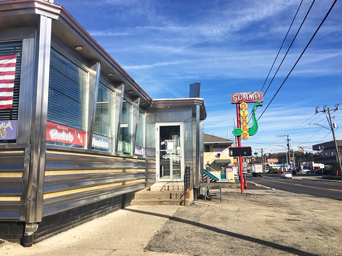 The Summit Diner's gleaming stainless steel exterior stands like a time capsule on Somerset's main drag, beckoning hungry travelers day and night.