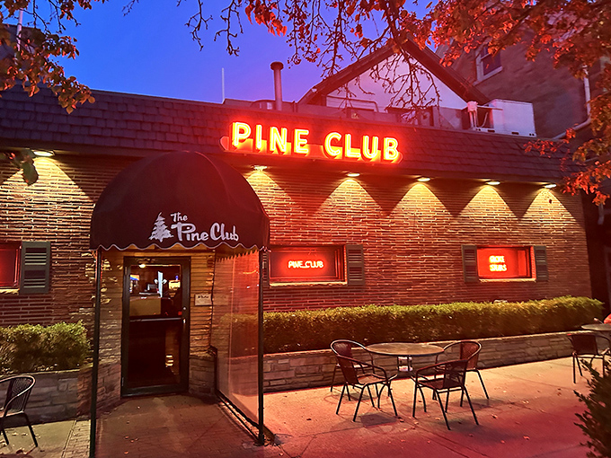 The neon glow of Pine Club's sign has been beckoning hungry Daytonians for decades, a red-lit promise of carnivorous delights within.