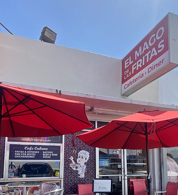 The unassuming storefront that launched a thousand food pilgrimages. Red umbrellas beckon like culinary sirens under the Miami sun.