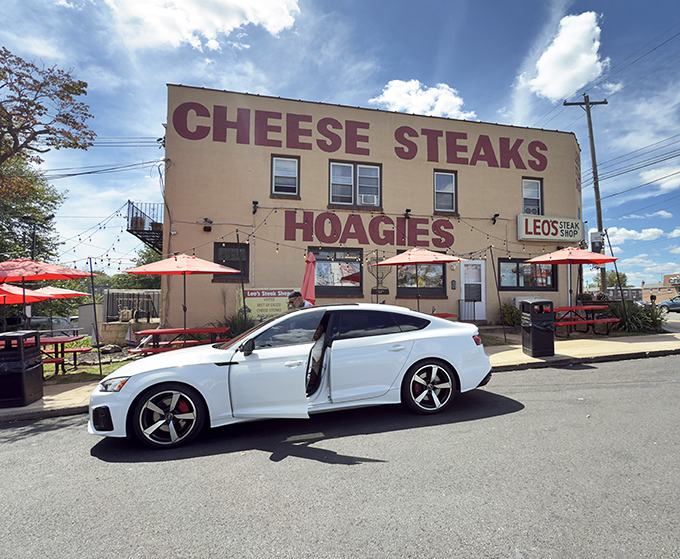 The unassuming yellow facade of Leo's Steak Shop stands as a beacon for sandwich aficionados, promising delicious treasures within those humble walls.