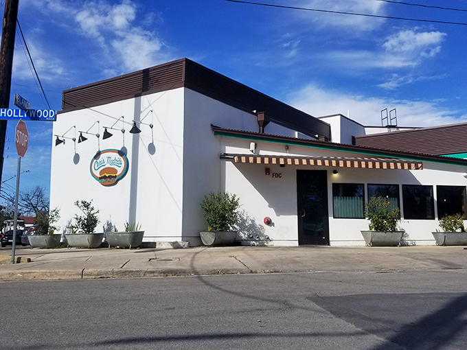 Clean lines, bright white walls, and that iconic burger sign – this is where San Antonio's burger dreams come true.