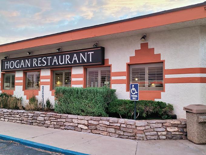 That coral-striped exterior isn't trying to impress anyone &ndash; and that's exactly why it does.