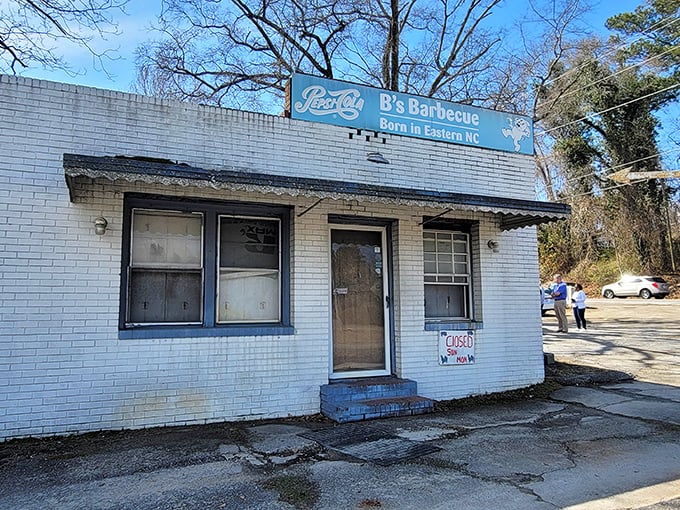 The unassuming white brick exterior of B's Barbecue stands like a barbecue beacon in Greenville. No fancy frills needed when the smoke does all the talking.