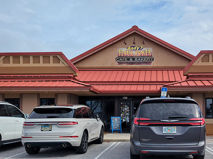 The distinctive red roof of Andy's Flour Power beckons breakfast enthusiasts like a lighthouse guiding hungry sailors to shore.