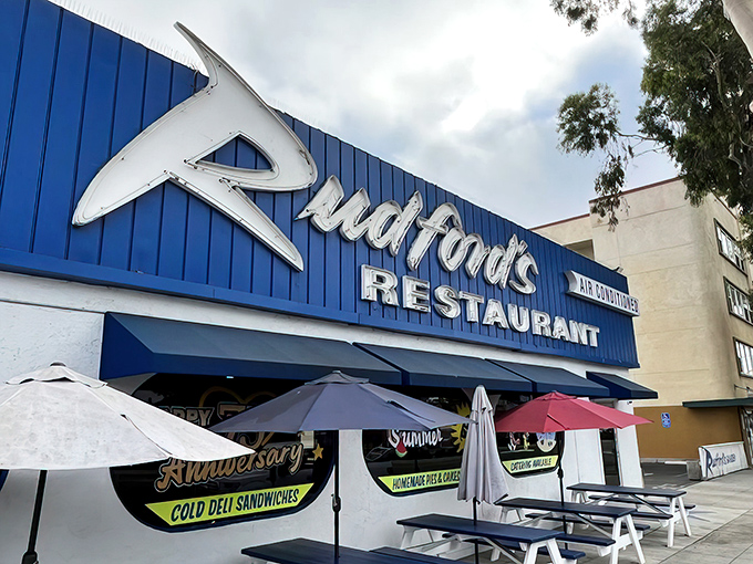 That iconic blue exterior with its retro signage isn't just a restaurant—it's a time machine with pancakes. Welcome to Rudford's.