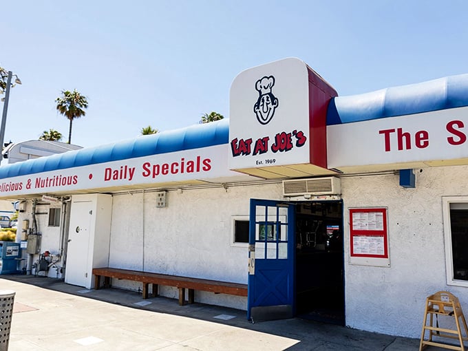 The iconic blue-trimmed exterior of Eat at Joe's stands as a beacon of breakfast hope along Pacific Coast Highway, promising delicious simplicity since 1969.