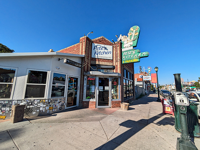 The iconic neon sign beckons hungry Denverites like a lighthouse for the famished. Pete's Kitchen stands proudly on Colfax, promising salvation from hunger at any hour.