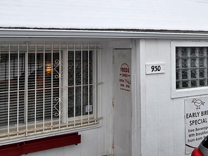 Fred's Diner's unassuming exterior is like that friend who doesn't brag but always delivers. The Early Bird Special sign hints at treasures within.
