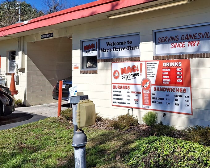 Mac's iconic white building with red trim stands as a time capsule of American drive-thru culture, beckoning hungry Gainesville locals with its no-nonsense charm.