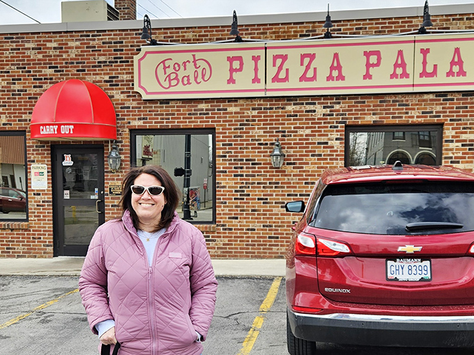 The iconic red awning of Fort Ball Pizza Palace stands as a beacon of hope for the pizza-deprived in Tiffin. No fancy frills needed when the food speaks this loudly.