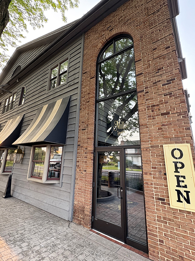 Miller's Smorgasbord stands like a culinary lighthouse in Ronks, its brick-and-siding exterior promising comfort food treasures within. The perfect Pennsylvania Dutch welcome wagon.