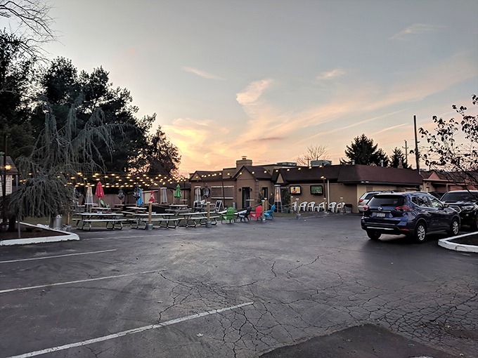 Sunset casts a golden glow over The Fainting Goat's exterior, turning an ordinary evening into the perfect backdrop for memory-making and comfort food indulgence.