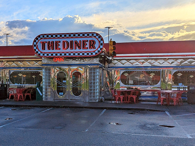 The gleaming chrome exterior of The Diner shines like a beacon of nostalgia on Dolly Parton Parkway, promising a time-traveling culinary adventure.