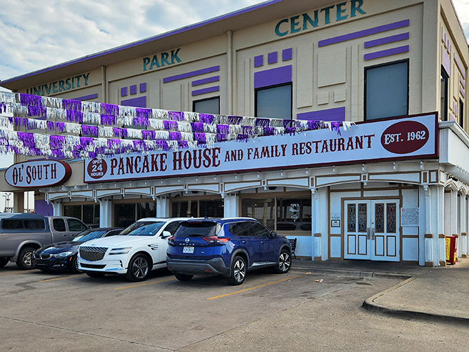 The purple and white streamers announce "yes, we're still here!" like an old friend waving from across the street. Ol' South Pancake House stands proudly in Fort Worth's University Park area.