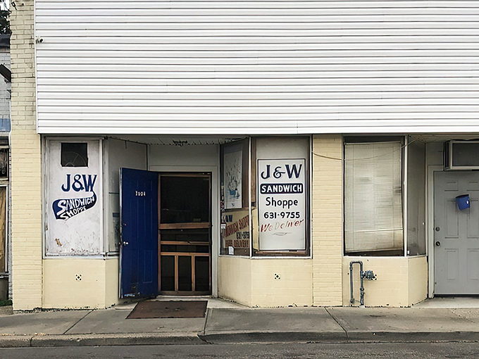 That blue door isn't just an entrance&mdash;it's a portal to sandwich nirvana. No fancy signage needed when what's inside speaks volumes.