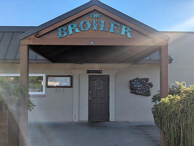 The unassuming entrance to The Broiler speaks volumes: culinary greatness doesn't need flashy neon or valet parking&mdash;just an honest promise of exceptional steak.