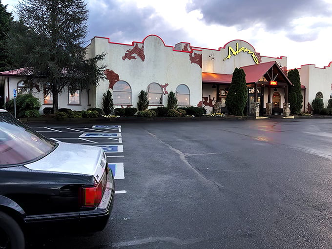 The Alamo Steakhouse stands proudly against the Tennessee sky, its distinctive architecture promising culinary adventures within those stucco walls.