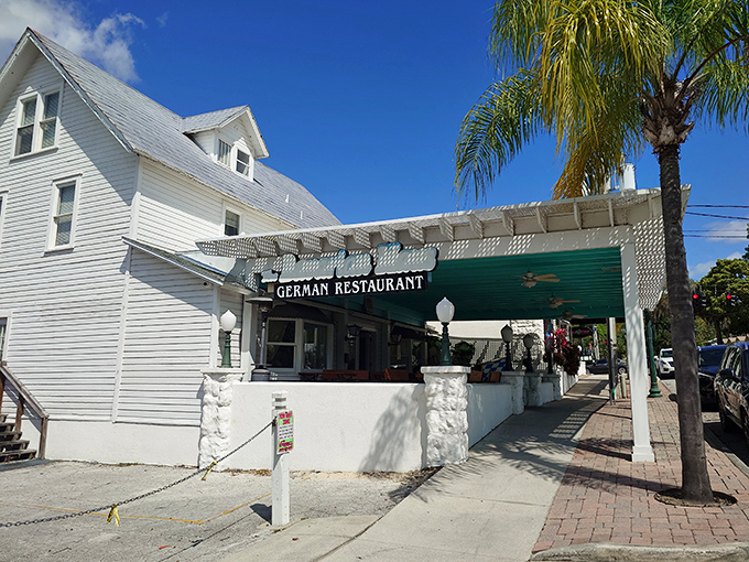 Florida palm trees meet German architecture in this charming white building that houses some of the most authentic schnitzel this side of Munich.