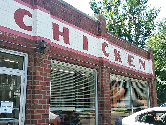 The iconic red and white brick exterior of Miller's Chicken stands as Athens' monument to fried poultry perfection, unchanged by time or trends.