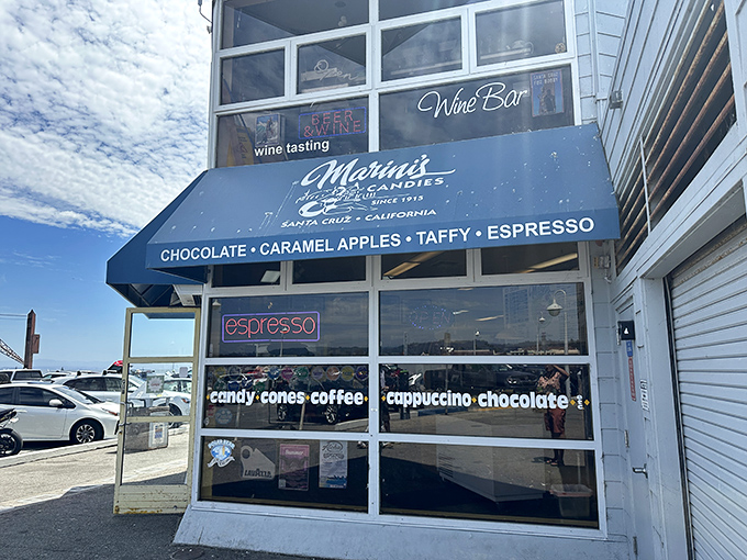 The iconic blue awning of Marini's beckons like a sugar-coated lighthouse on the Santa Cruz coast. Sweet salvation awaits inside!