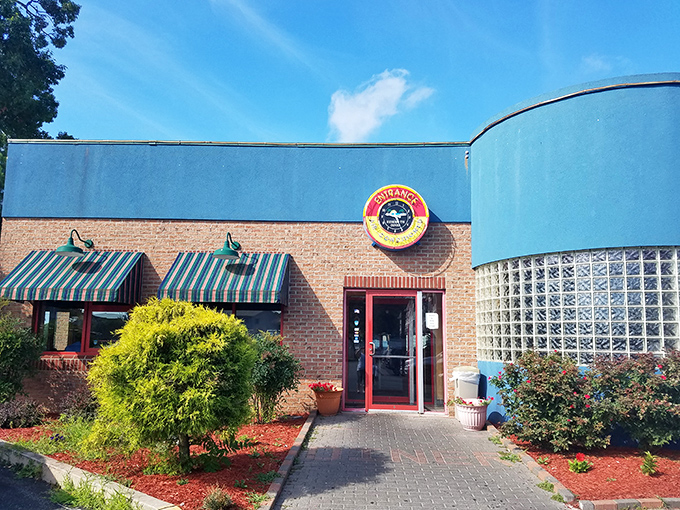 That classic brick-and-blue exterior whispers "real food lives here" to anyone with breakfast wisdom.