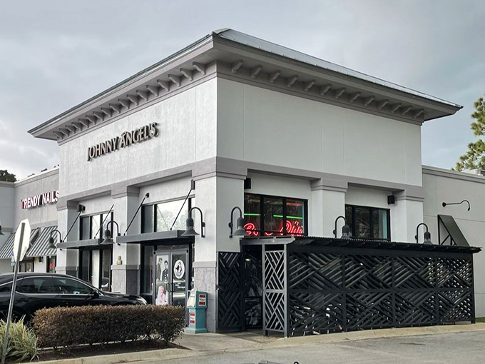 Johnny Angel's exterior stands like a beacon of breakfast hope, its clean white fa&ccedil;ade promising retro delights within those Jacksonville walls.