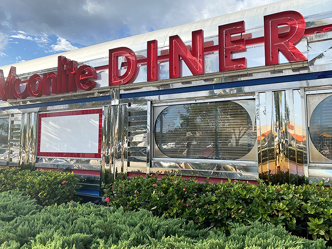 That iconic silver exterior with bold red lettering isn't just announcing a diner&mdash;it's promising a time-traveling culinary adventure in Dania Beach.