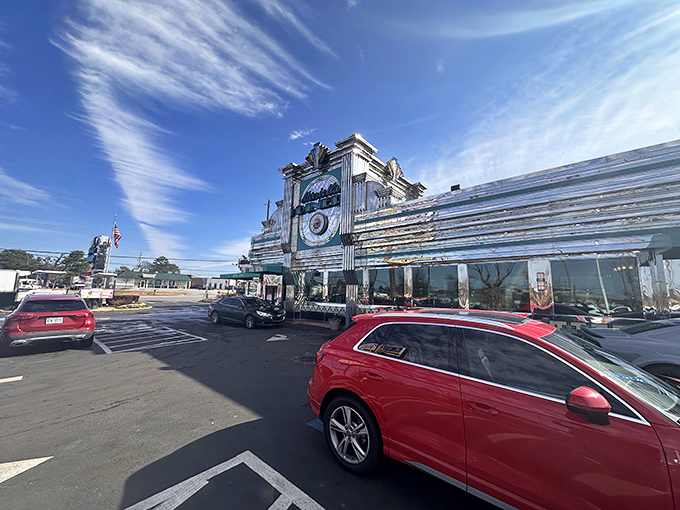 The gleaming chrome exterior of Marietta Diner stands like a time-traveling spaceship that landed in Georgia with one mission: delivering comfort food that defies gravity.