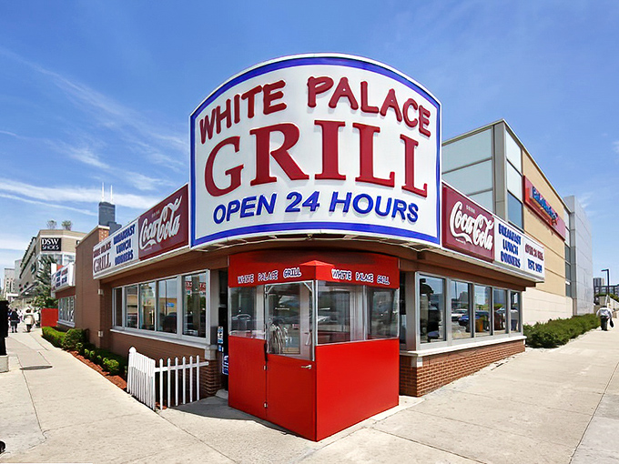 The iconic red and white corner building stands like a 24-hour lighthouse for hungry souls navigating the urban seas of Chicago.