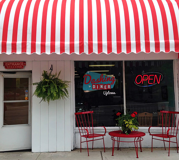 That mint-green facade with candy-striped awnings isn't just eye-catching&mdash;it's a time machine disguised as a diner in downtown Johnstown.