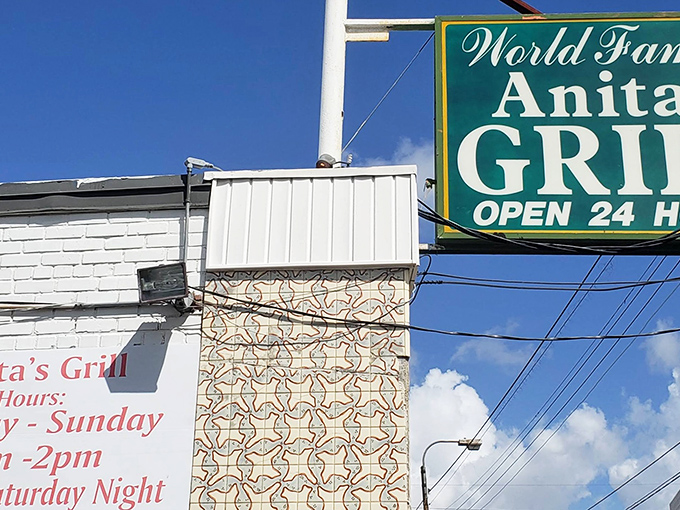 The iconic green sign promises "World Famous" fare and 24-hour service&mdash;a beacon of hope for hungry souls at any hour in the Crescent City.