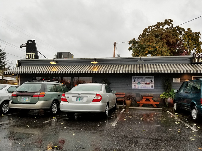 The unassuming exterior of Nite Hawk might not scream "culinary destination," but that black hawk sign has been guiding hungry Portlanders to comfort food nirvana for decades.