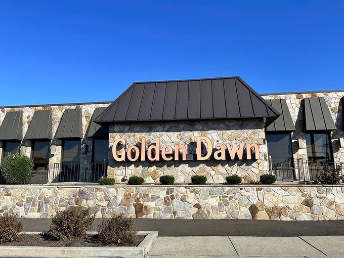 The stone facade of Golden Dawn stands proudly against the blue Pennsylvania sky, like a culinary fortress guarding delicious secrets within.