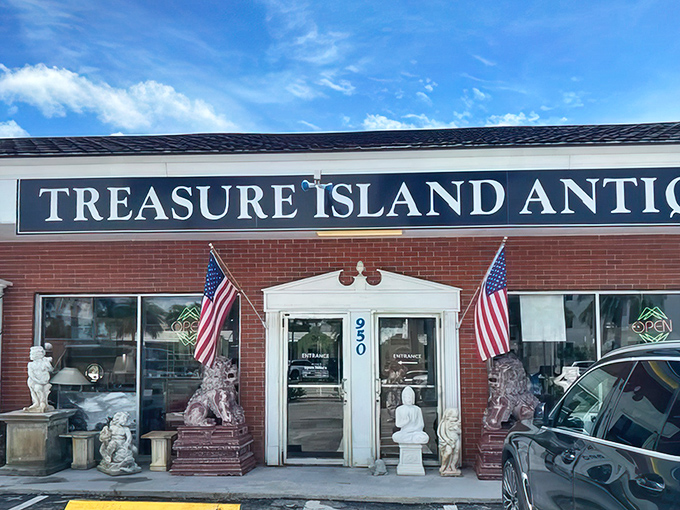 The sun-drenched fa&ccedil;ade of Treasure Island Antiques beckons with patriotic flair, promising air-conditioned adventures through decades of American nostalgia.