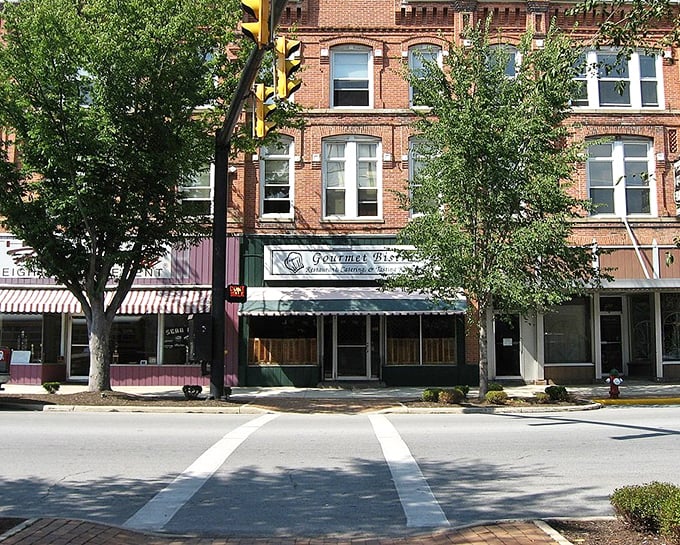 Historic brick buildings line the main street of St. Marys, where small-town charm meets affordable living in a picture-perfect downtown setting.