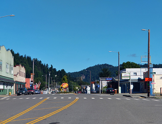 Main Street stretches out like a welcome mat, with mountains standing guard over this pocket-sized paradise.