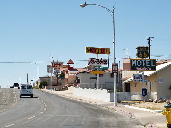 Main Street Barstow stretches toward the horizon like a desert mirage, except this one comes with traffic lights and the promise of air conditioning.