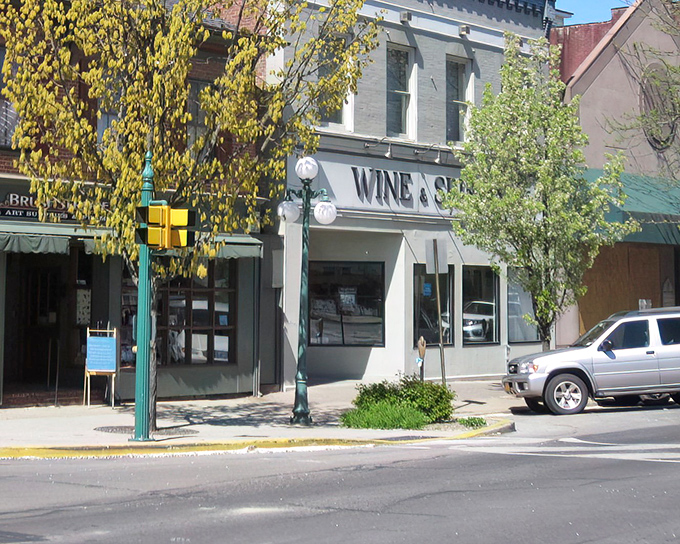 Market Street's historic storefronts offer a glimpse into small-town charm where your retirement dollars stretch further than your patience at big city prices.