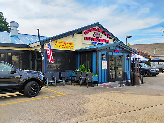 The blue exterior of Captain Groovy's beckons like a coastal lighthouse for the hungry. That "Groovy Happy Hour" sign might as well say "salvation for your seafood cravings."