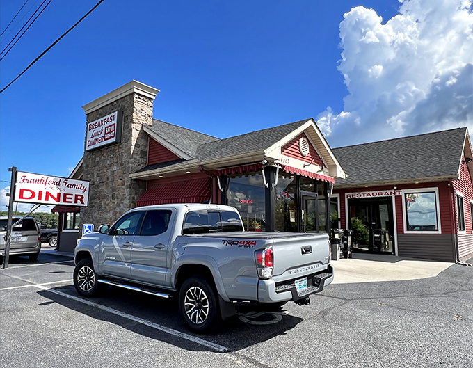 The iconic red exterior of Frankford Family Diner stands as a beacon of comfort food promise along Delaware's roadside, where culinary magic awaits behind those unassuming walls.